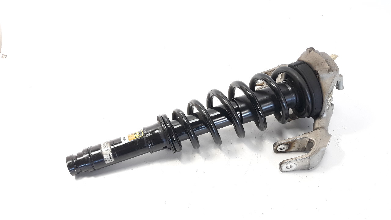Left front shock absorber CADILLAC SRX 4.6 AWD 7784132 | B-Parts